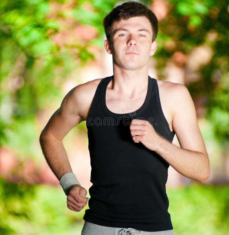 Handsome man jogging stock image. Image of grass, healthy - 35757583