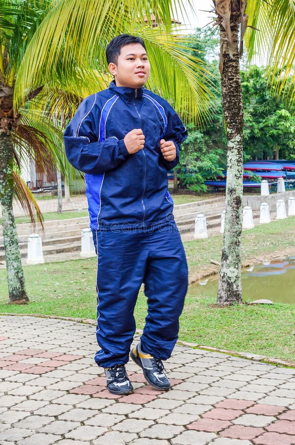 Young man jogging stock photo. Image of marathon, outside - 32252558