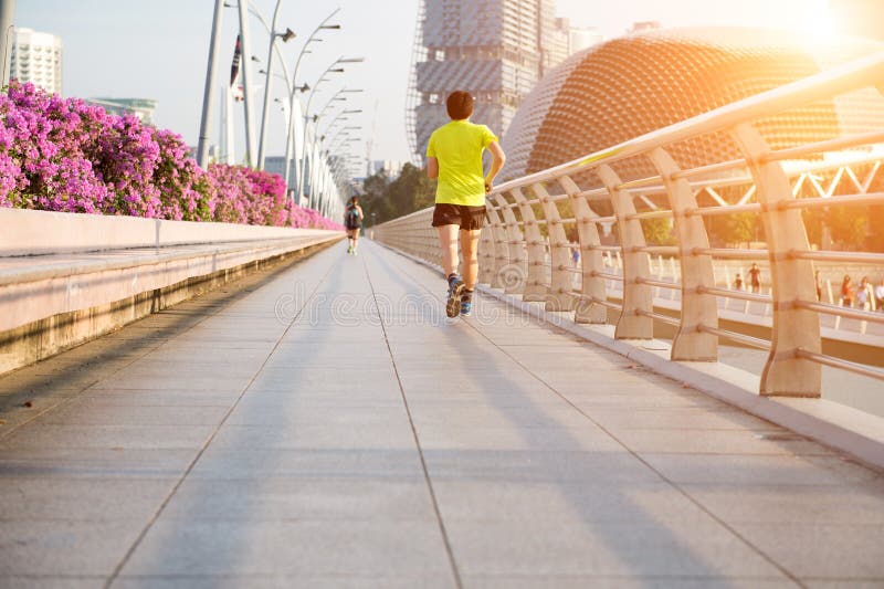 Young Man is Jogging on Road. Stock Image - Image of fitness, outside ...