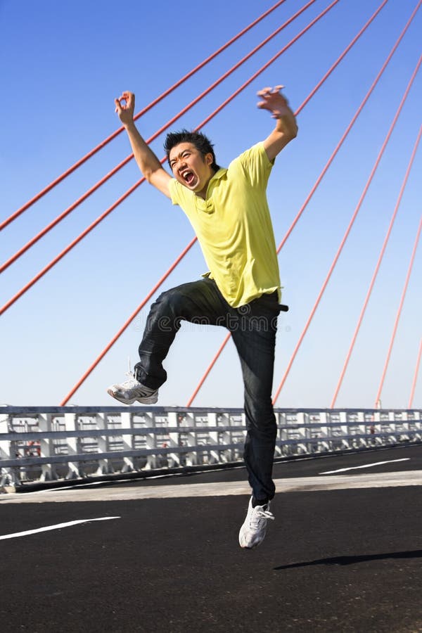 Young Man Jump Very High in Bridge Area Stock Photo - Image of ...