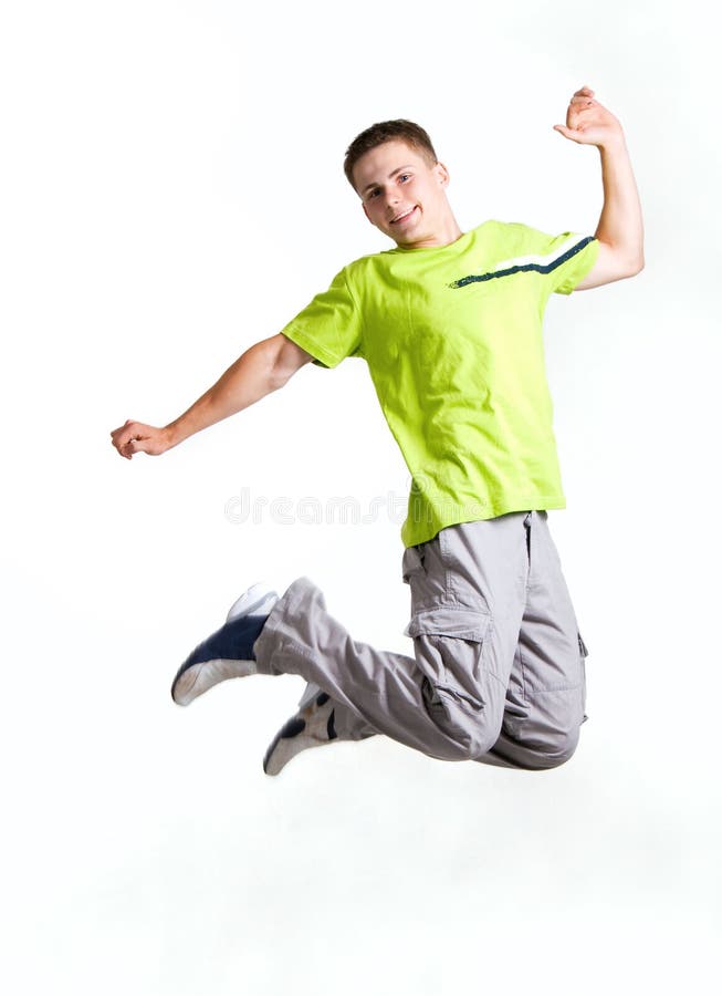Young man jumping stock image. Image of clothing, beautiful - 10317231