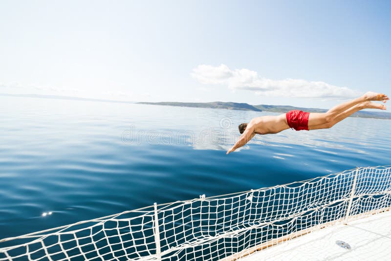 Person Jumping Off Sail Boat Stock Photos - Free & Royalty-Free Stock ...