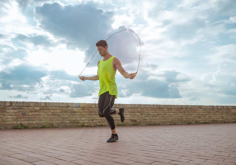 Young Man Jumping Rope Sky Sunny Stock Photo - Image of tights, lens ...
