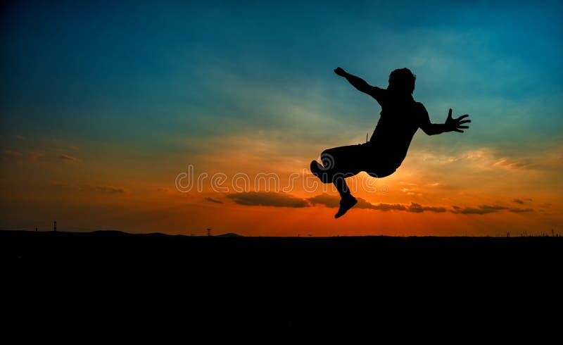 Young Man Jumping in the Sunset Stock Photo - Image of life, high: 69952722