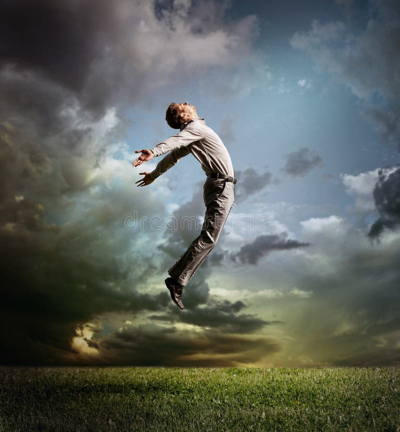 Man Jumping Up To Sky Wit Color Bright Balloon Stock Image - Image of ...