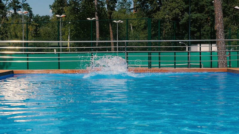 Young Man Jumps in Swimming Pool Stock Footage - Video of relax, enjoy ...