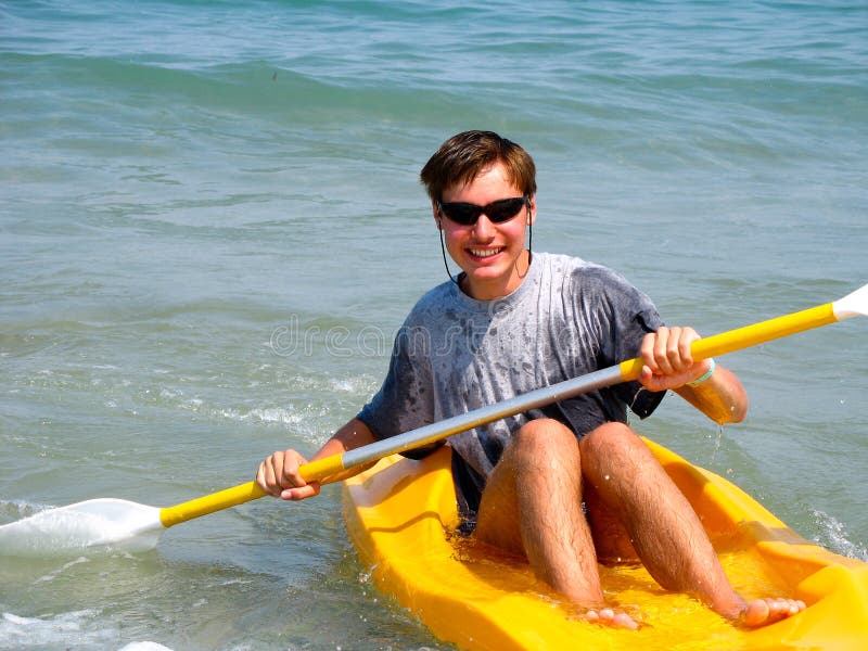 Young man kayaking stock image. Image of exercise, healthy - 9523583