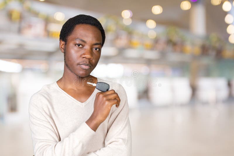 Young man with the keys stock image. Image of adult, people - 69703407