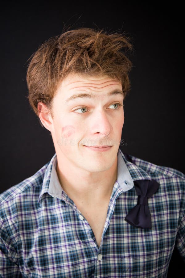 Young Man with Kiss Trace on the Cheek Stock Image - Image of looking ...