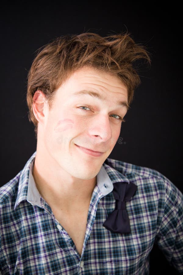 Young Man with Kiss Trace on the Cheek Stock Photo - Image of caucasian ...