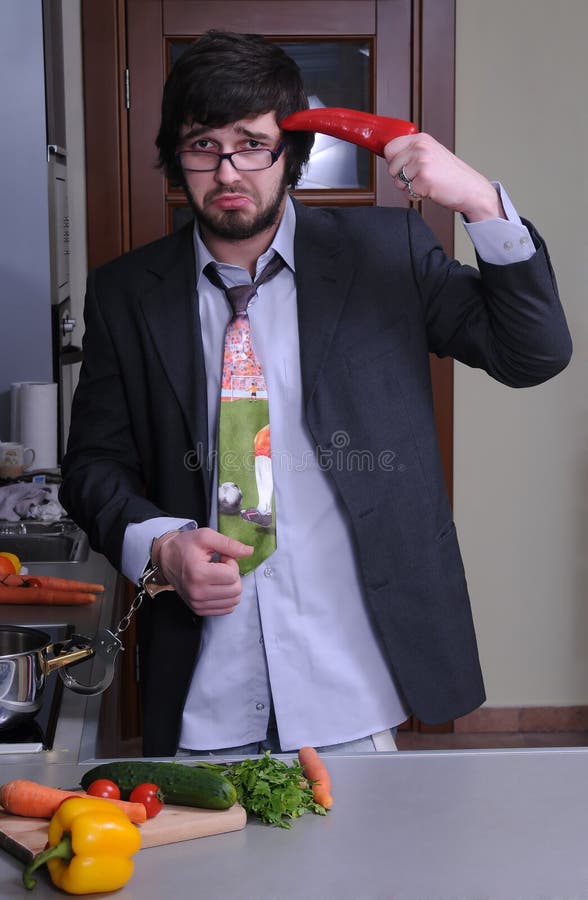 Young Man in the Kitchen Cuffed Stock Photo - Image of kitchen ...