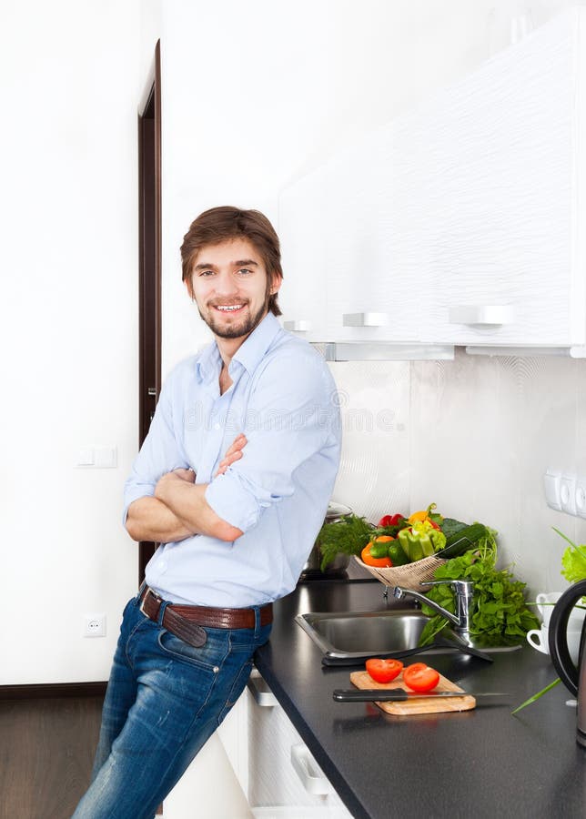 Young man kitchen stock photo. Image of green, lunch - 35679054