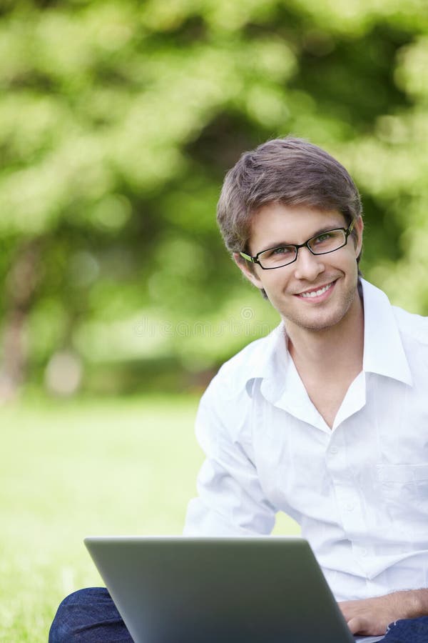 Young man with laptop stock image. Image of cheerful - 16154963