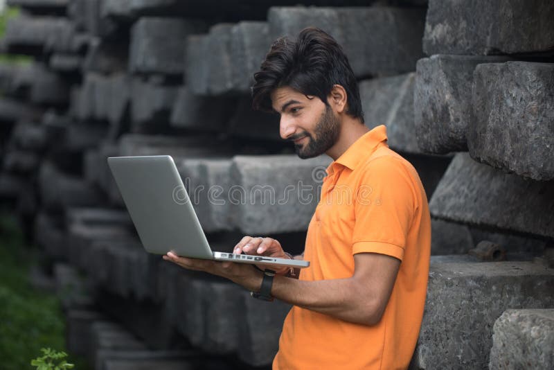 Young Man with laptop stock image. Image of manager - 105296661 Young Man with laptop stock image. Image of manager - 105296661