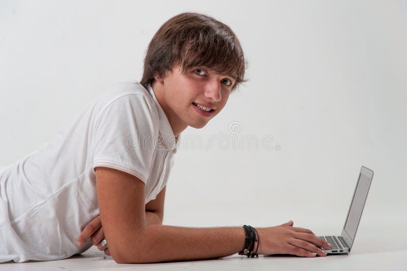 Young man with laptop stock photo. Image of fellow, white - 32305840