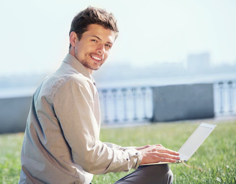 Young Man with Laptop Outdoor Portrtait Stock Image - Image of outdoor ...