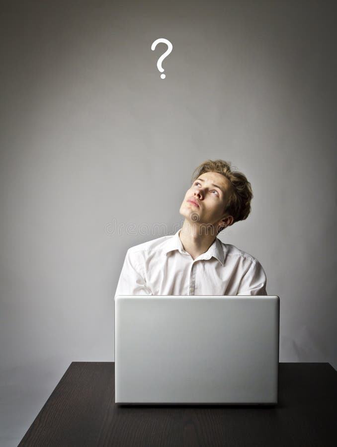 Young Man with Laptop. Question and Ignorance Concept Stock Photo - Image of complicated ...