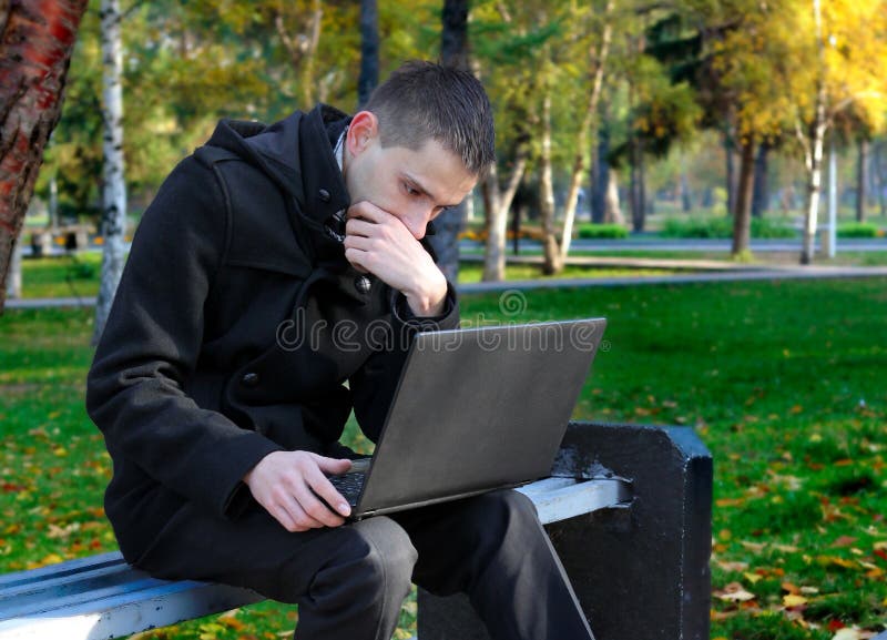 Young Man with Laptop stock image. Image of portable - 58719087