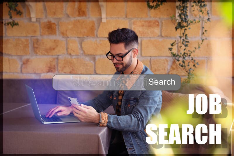 Young Man with Laptop and Smartphone at Table. Job Search Stock Photo ...