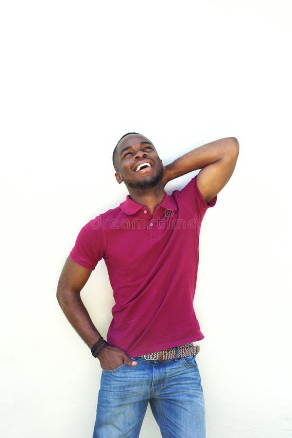Young Man Laughing with Hand Behind Head Stock Image - Image of hand ...