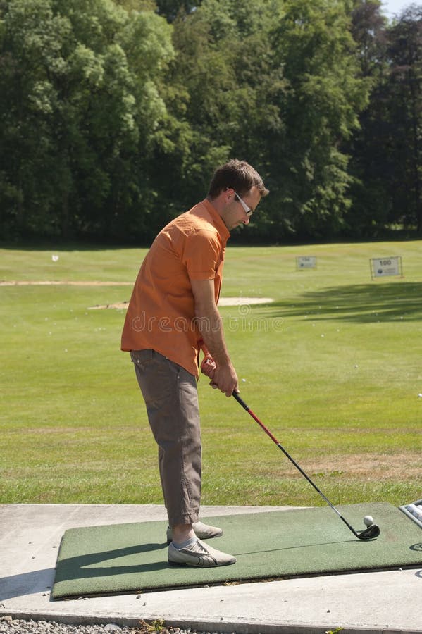 Young Man Learning Golf at the Driving Range Stock Image - Image of ...