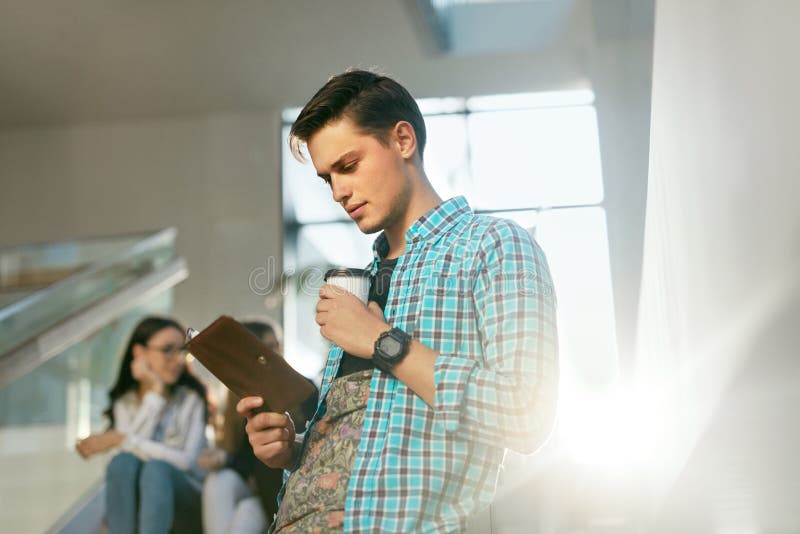 Young Man Learning, Reading Notes in Book Stock Photo - Image of ...