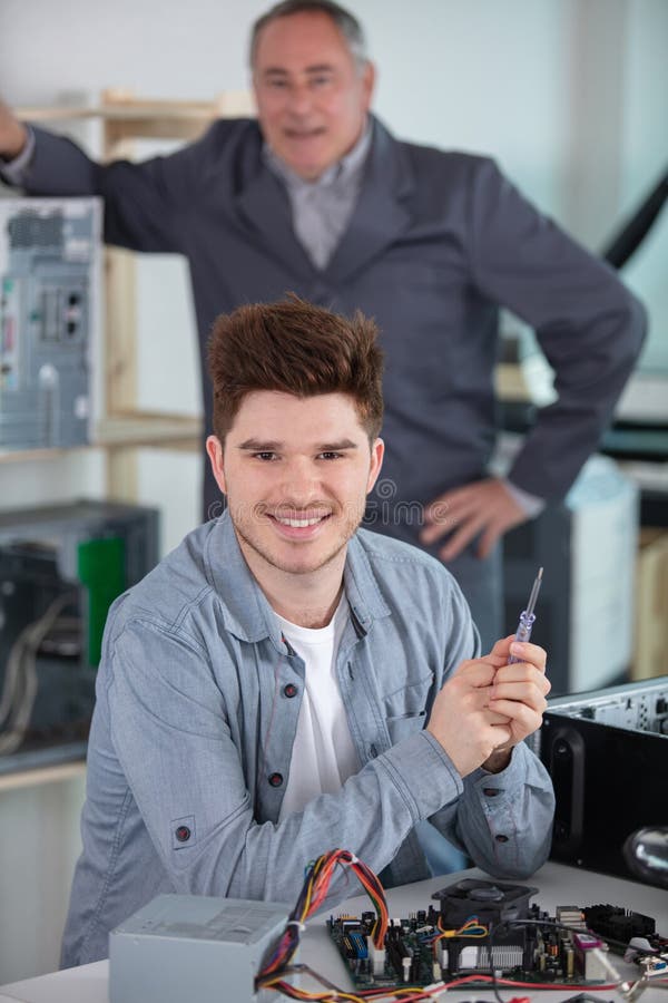 Young Man Learning To Solder Wire Stock Image - Image of technical ...