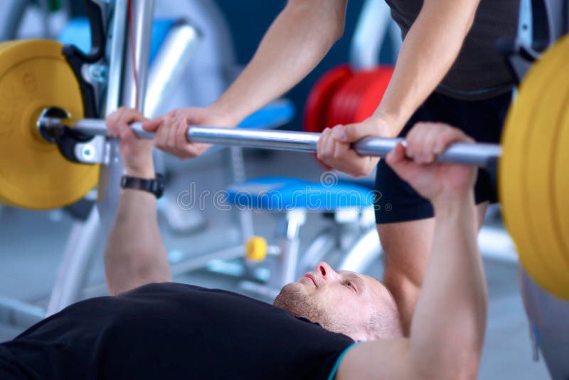 Young Man Lifting the Barbell in Gym with Stock Photo - Image of sport ...