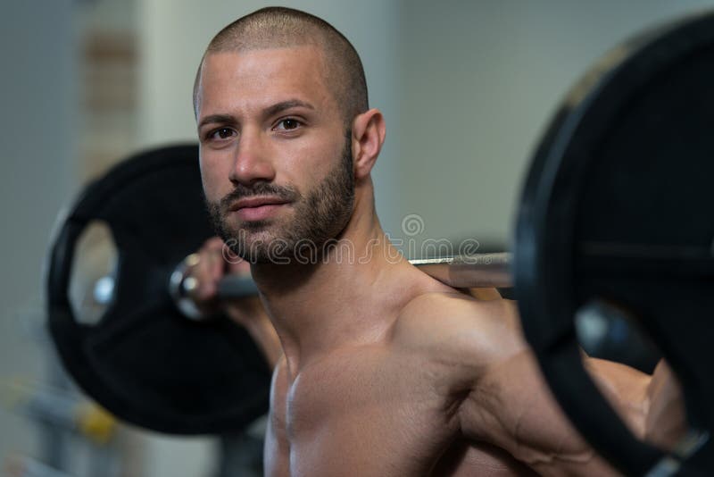 Young Man Lifting Weights With Barbell - Stock Image - Everypixel