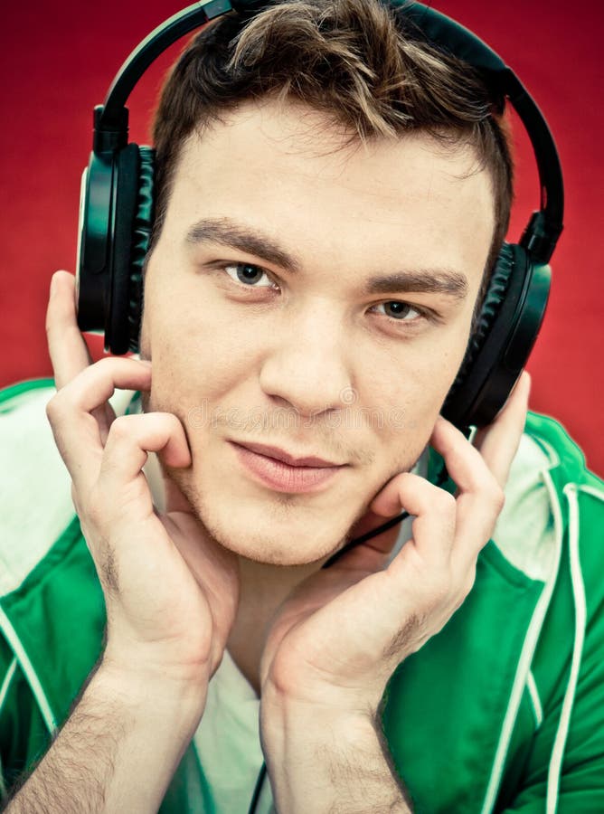 Young man listening music stock photo. Image of people - 21621006