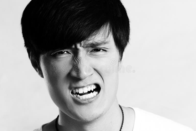 Young man looking angry stock image. Image of fear, outrage - 35313793