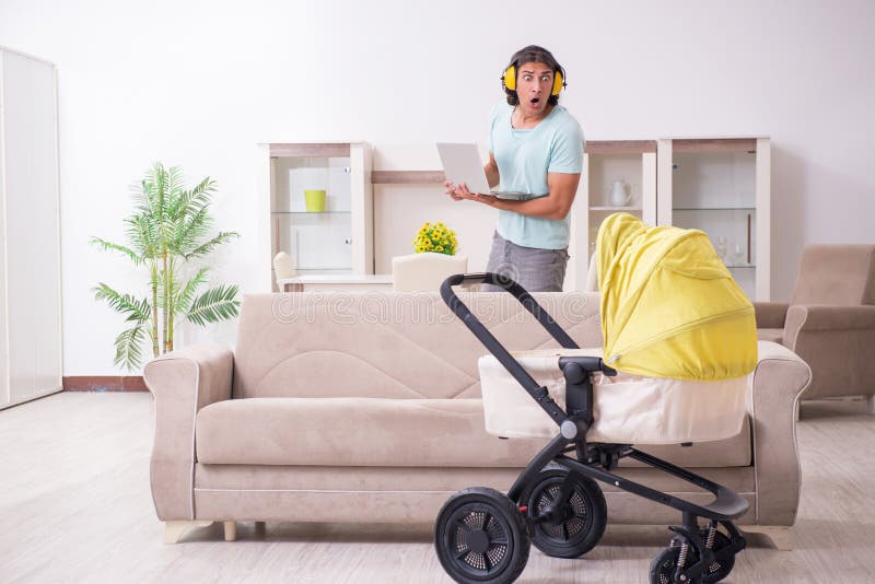 Young Man Looking after Baby in Pram Stock Image - Image of father ...