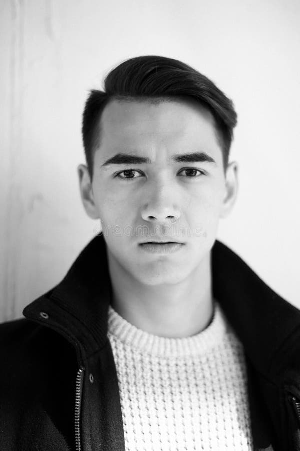 Young Man Looking into the Camera ,open Look. . Model Posing Stock ...