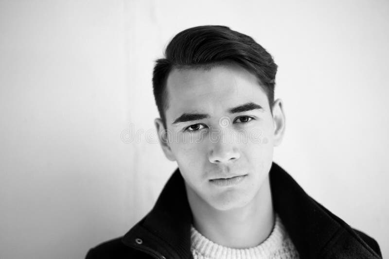Young Man Looking into the Camera ,open Look. . Model Posing Stock ...