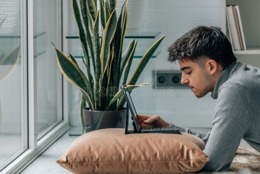 Young Man Looking at Computer or Laptop Stock Image - Image of ...