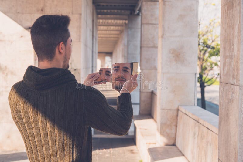 Young Man Looking at Himself in a Broken Mirror Stock Photo - Image of ... Young Man Looking at Himself in a Broken Mirror Stock Photo - Image of ...