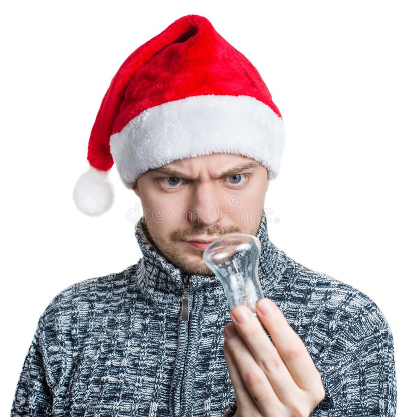 Young Man Looking at Light Bulb. Stock Photo - Image of innovative ...