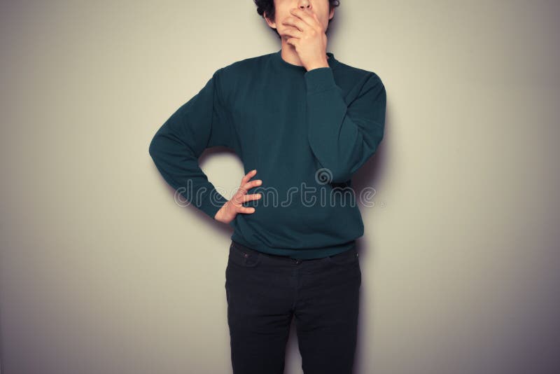 Young man looking nervous stock photo. Image of nervous - 40628768