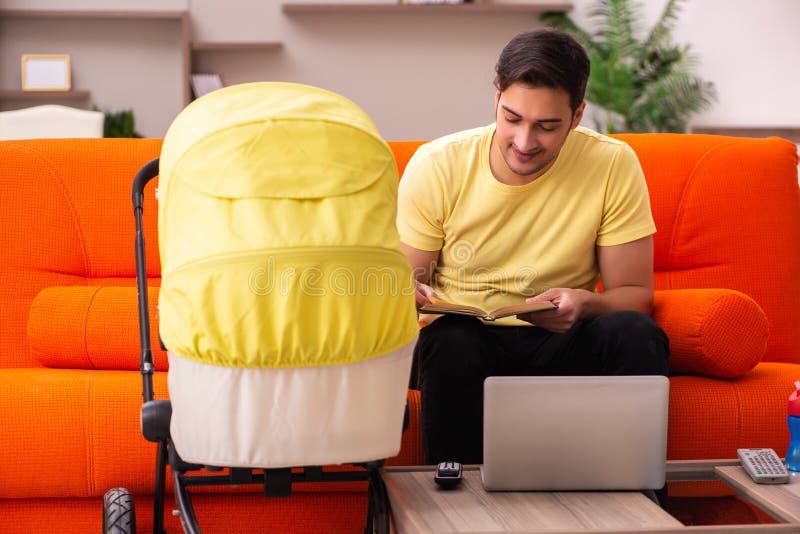 Young Man Looking after New Born at Home Stock Photo - Image of nursing ...