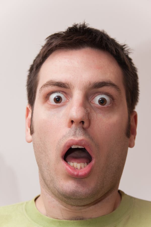 Young Man Looking Scared and Shocked Stock Photo - Image of offended ...