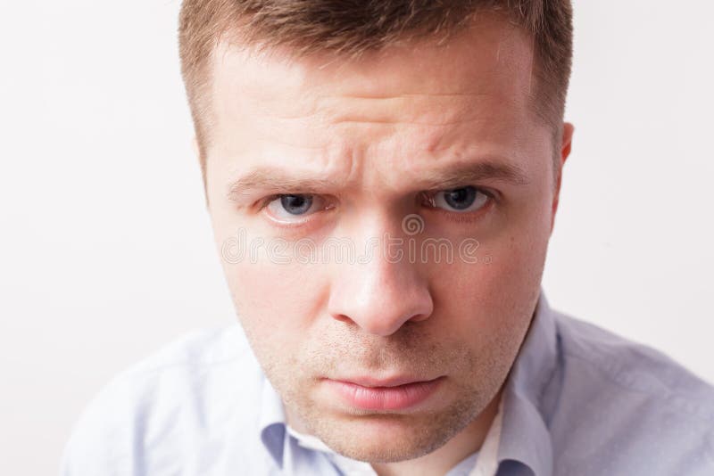 Young Man Looking Seriously Forward, Carefully Looking Stock Image ...