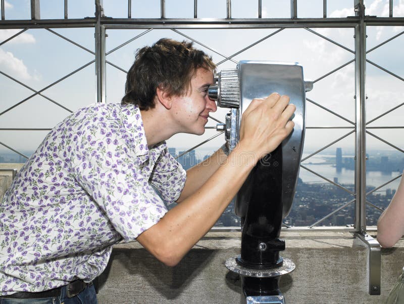 Young Man Looking through Telescope Stock Image - Image of attraction ...