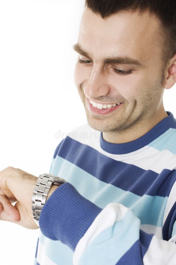 Young Man Looking at the Time in His Watch Stock Photo - Image of ...