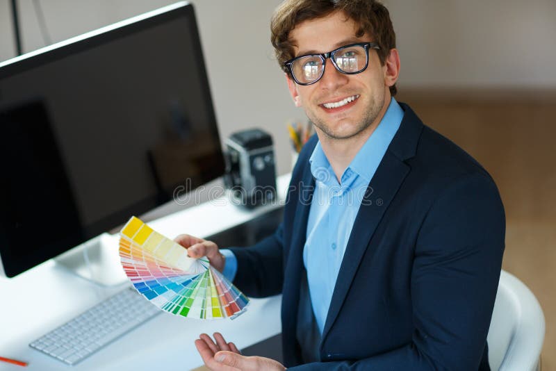 Young Man Looking To a Color Paint Palette Stock Image - Image of ...