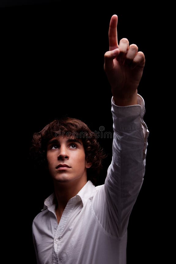 Young Man Looking Up To the Light and Pointing Stock Photo - Image of ...