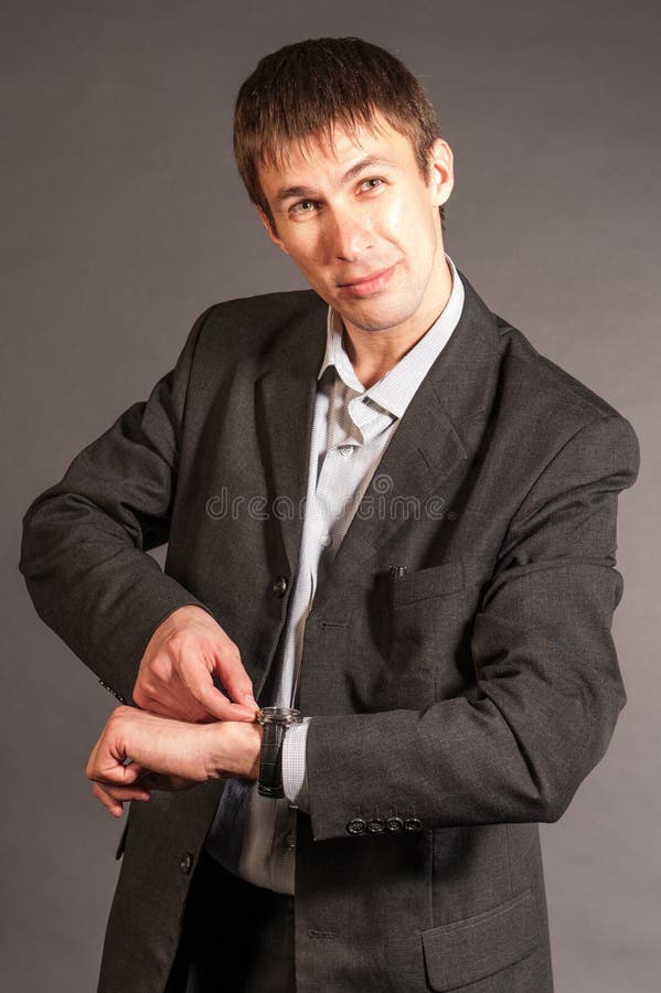 Young Man Looking Watch on His Hand Stock Photo - Image of business ...