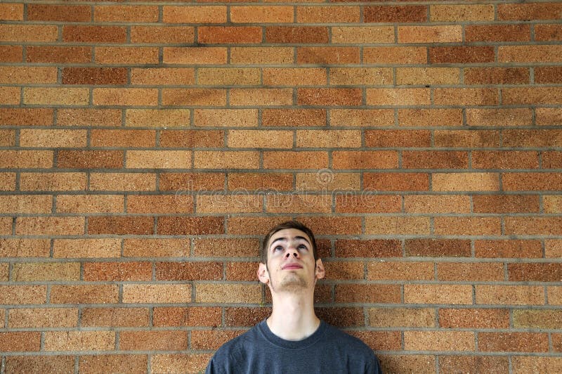 Young man looks up above stock photo. Image of single - 14288680