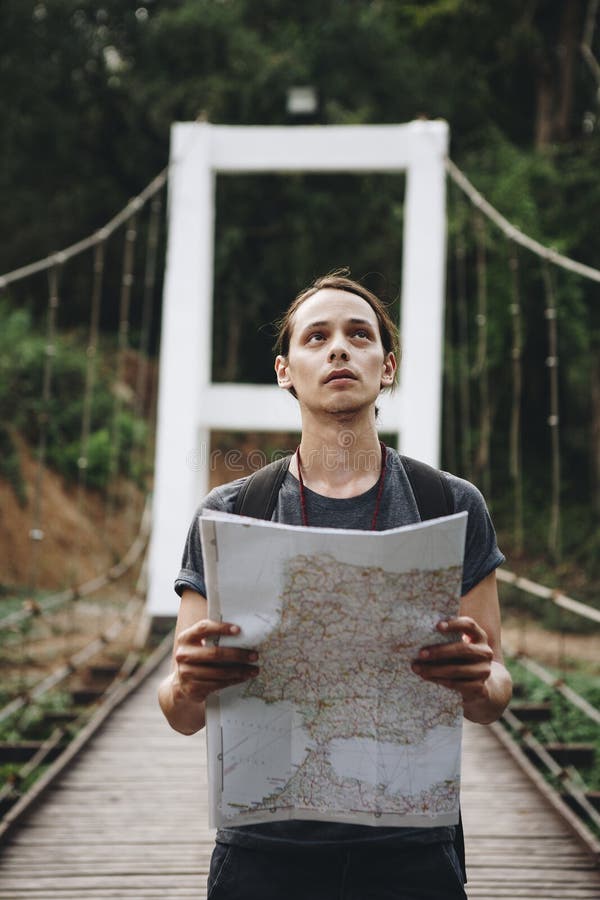 Young Man Lost Direction with a Map Stock Image - Image of forward ...