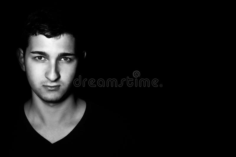 Young Man Low Key, Black and White Stock Photo - Image of handsome ...