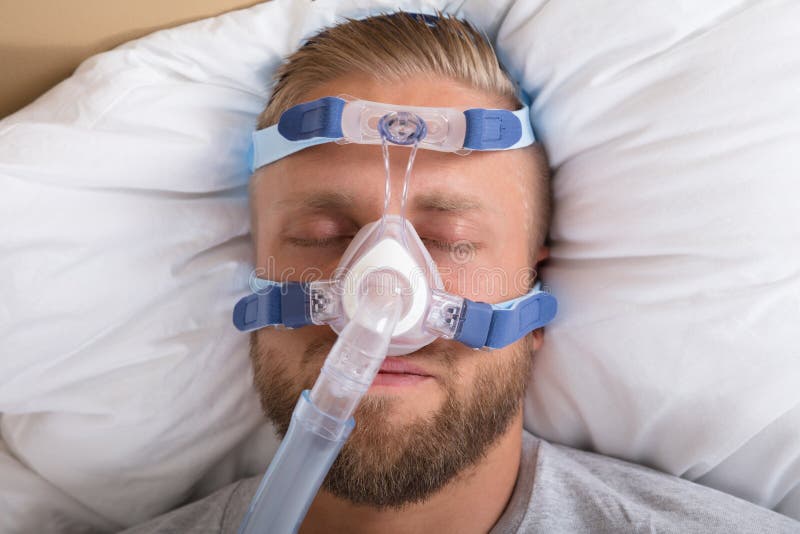 Man with Sleeping Apnea and CPAP Machine Stock Photo - Image of care ...